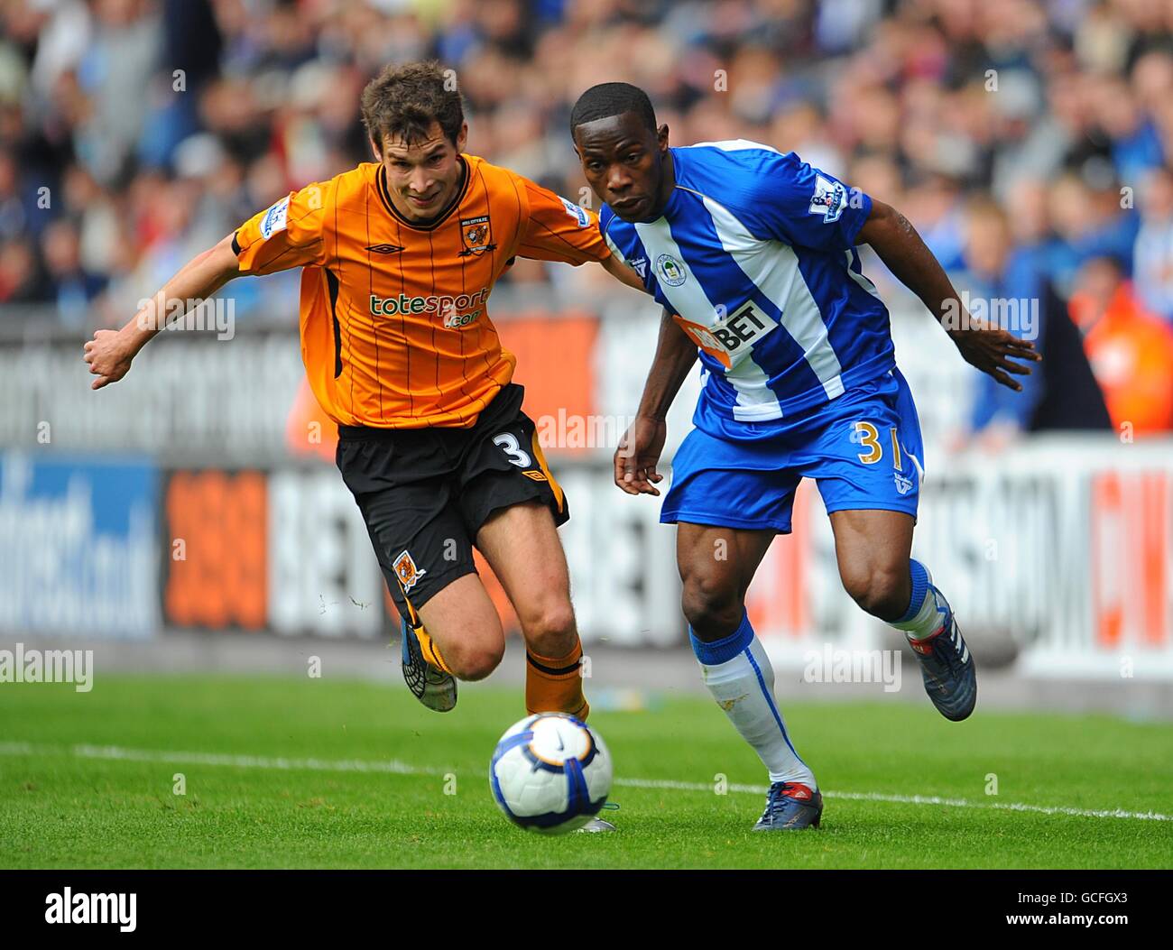 Hull City's Will Atkinson (left) and Wigan Athletic's Maynor Figueroa ...