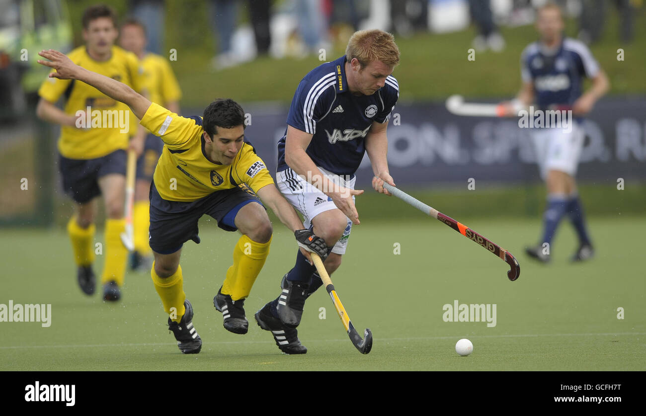 East Grinstead's Andy Piper gets away from Beeston's Ben Arnold (Left ...