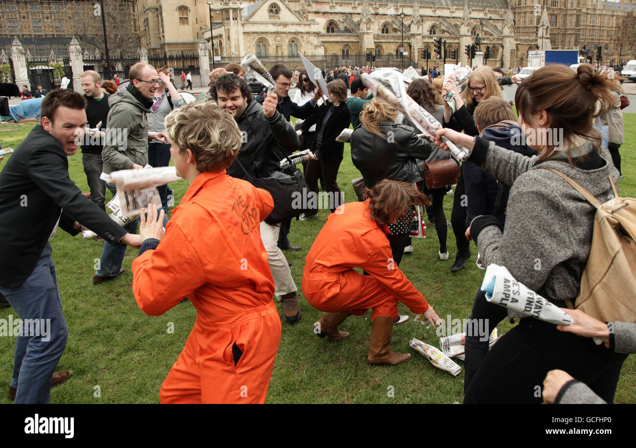 Voters from across London have a sword fight using rolled-up newspapers ...