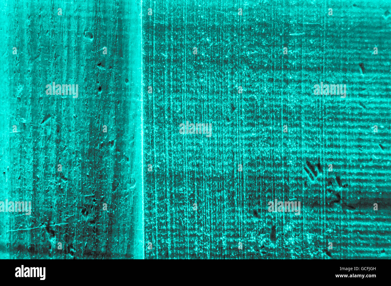 Rough grainy wood mainly turquoise grayish grayscale colors hard light ...