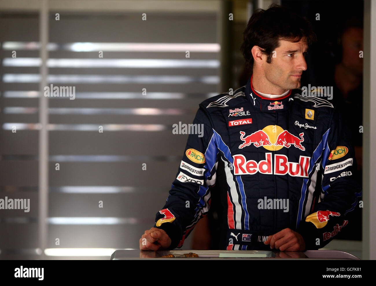 Red Bull Racing's Mark Webber in the garage during third practice at ...