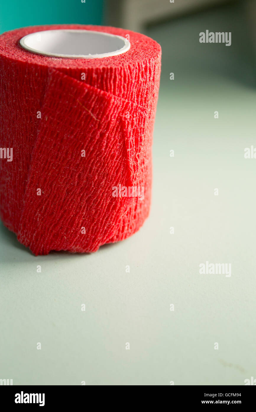 Red kinesio tape roll hi-res stock photography and images - Alamy