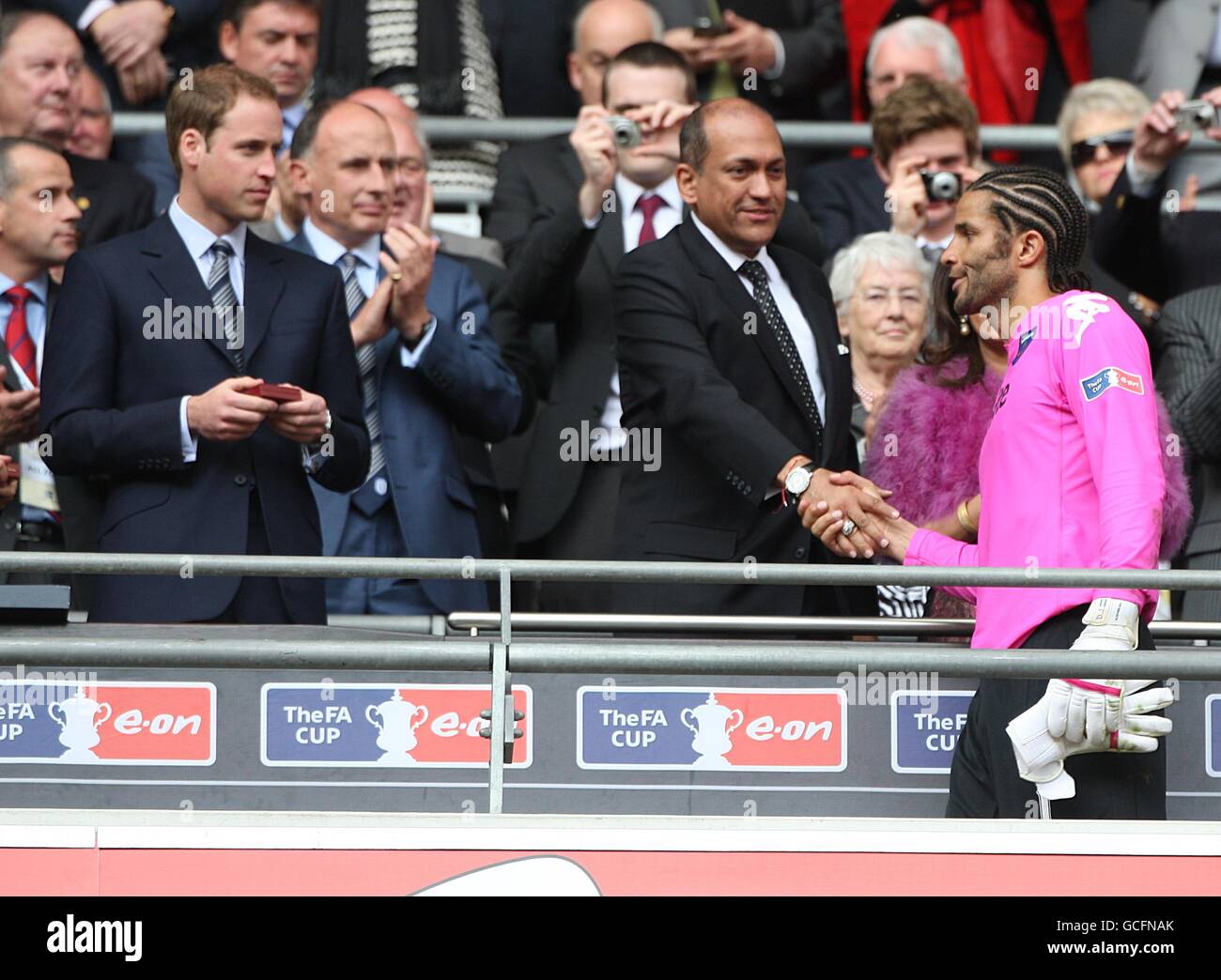 Prince William (left) looks on as Portsmouth owner Belram Chanrai ...