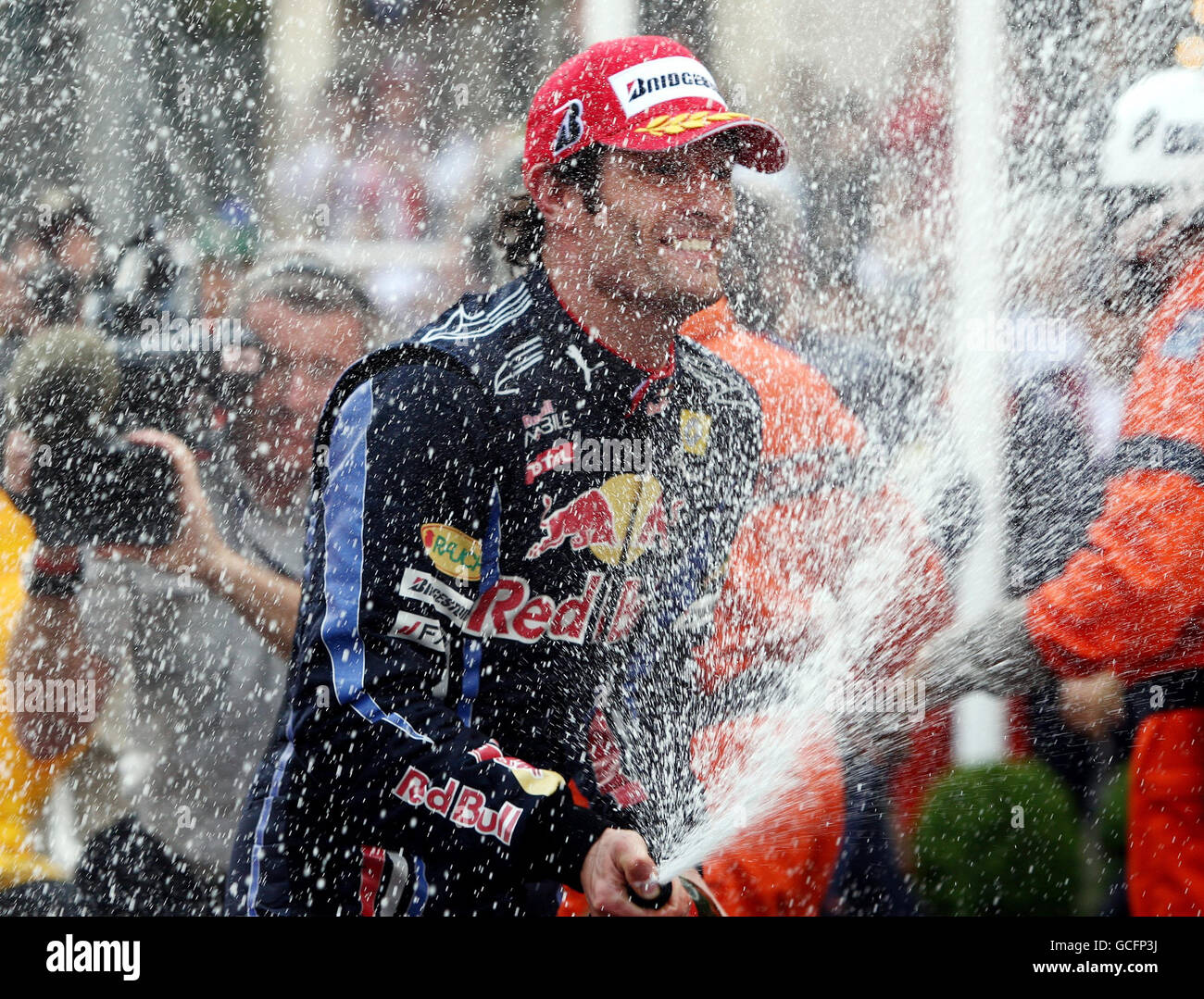 Red Bull driver Mark Webber celebrates his victory following the Monaco ...