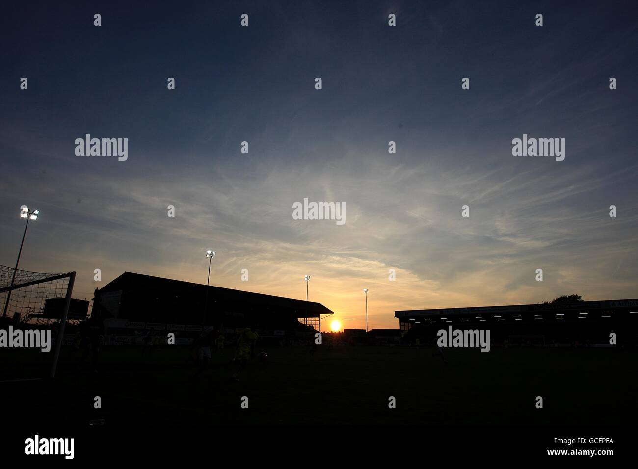 Soccer football setting sun gv general view hi-res stock photography ...