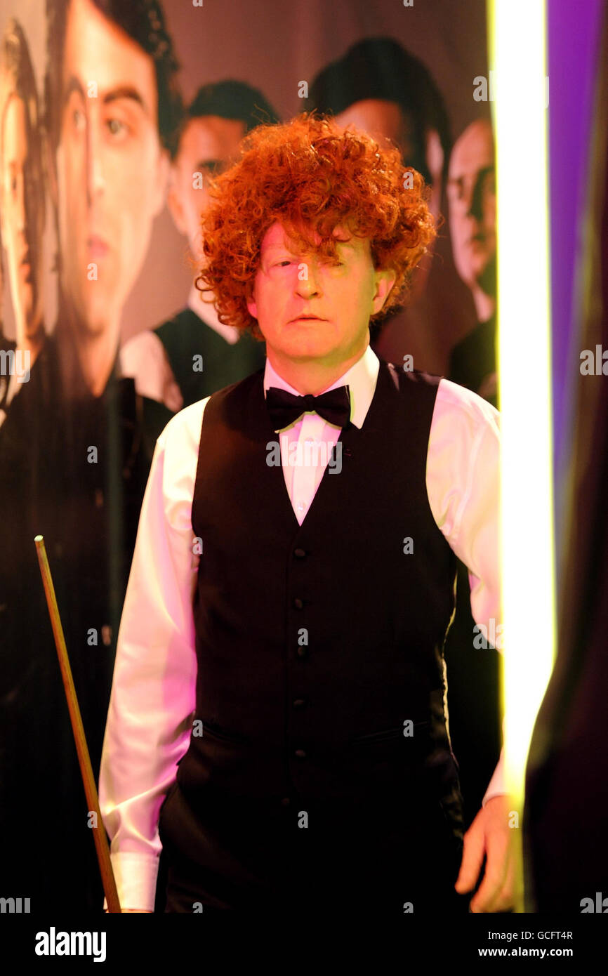 Steve Davis wearing a fake ginger wig enters the playing area prior to ...