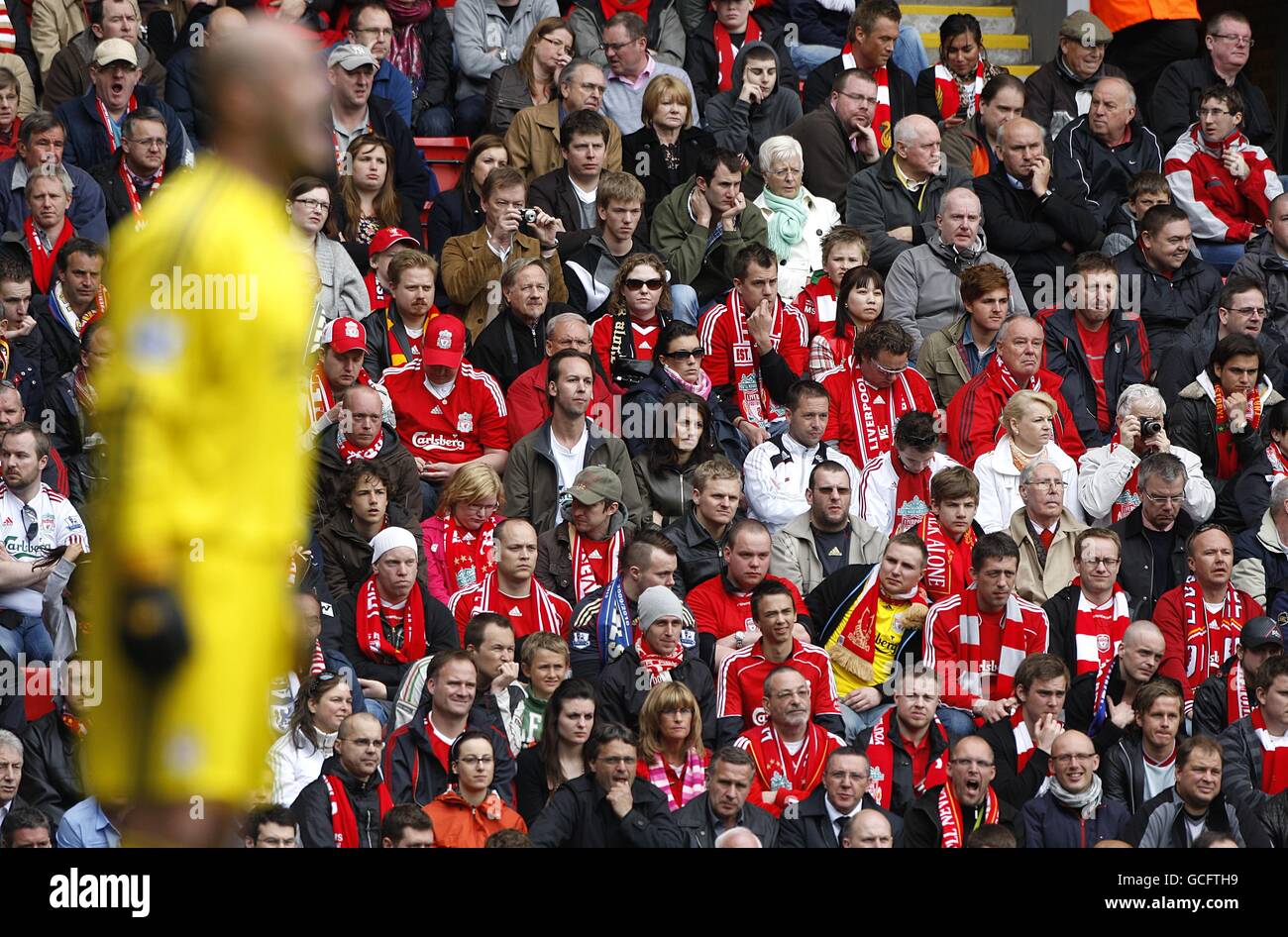 Liverpool fans sit dejected in the stands as Liverpool goalkeeper Jose ...