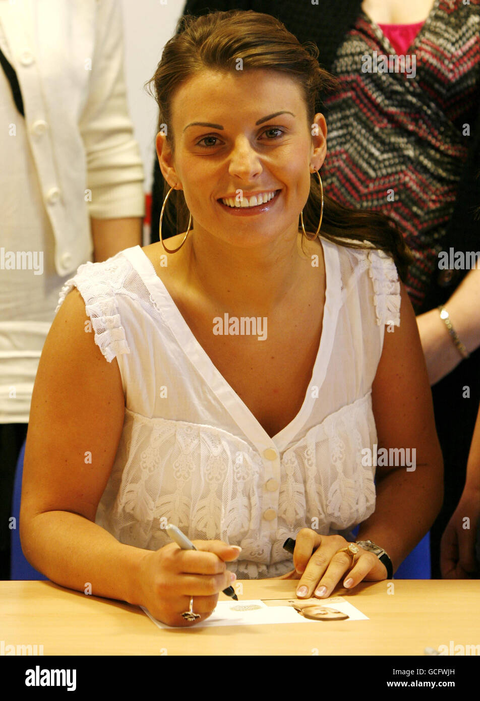 Coleen opens Argos store. Coleen Rooney opens a new Argos store at ...