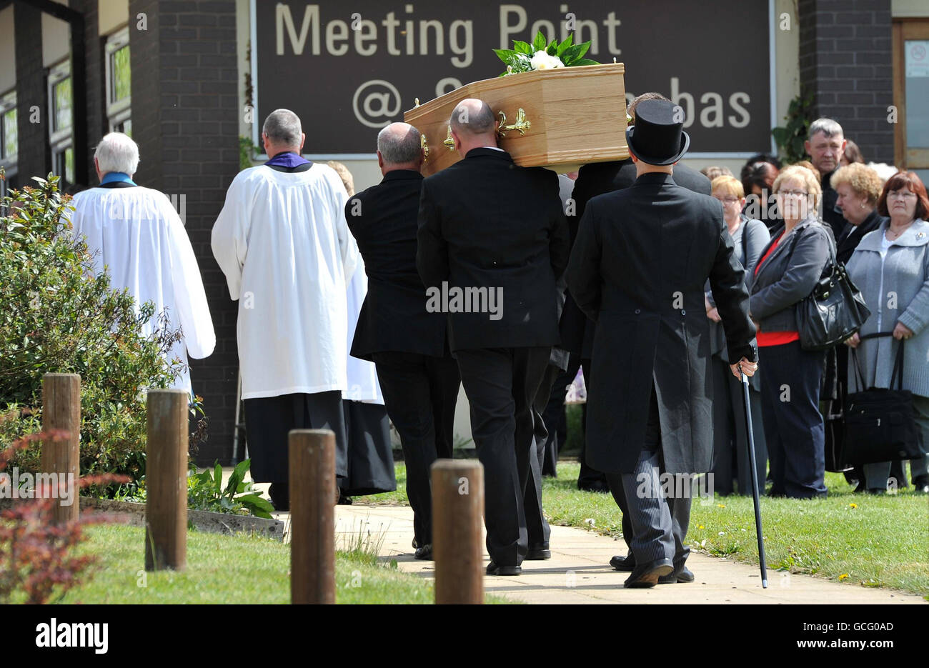 The coffin of David Askew is carried into St Barnabas Church ...