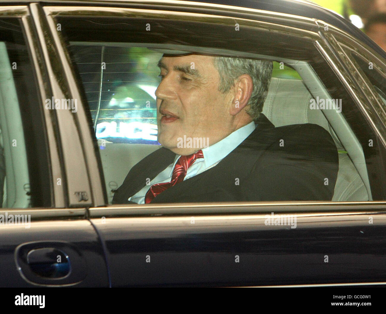 Prime Minister Gordon Brown is seen in a car leaving Downing Street ...