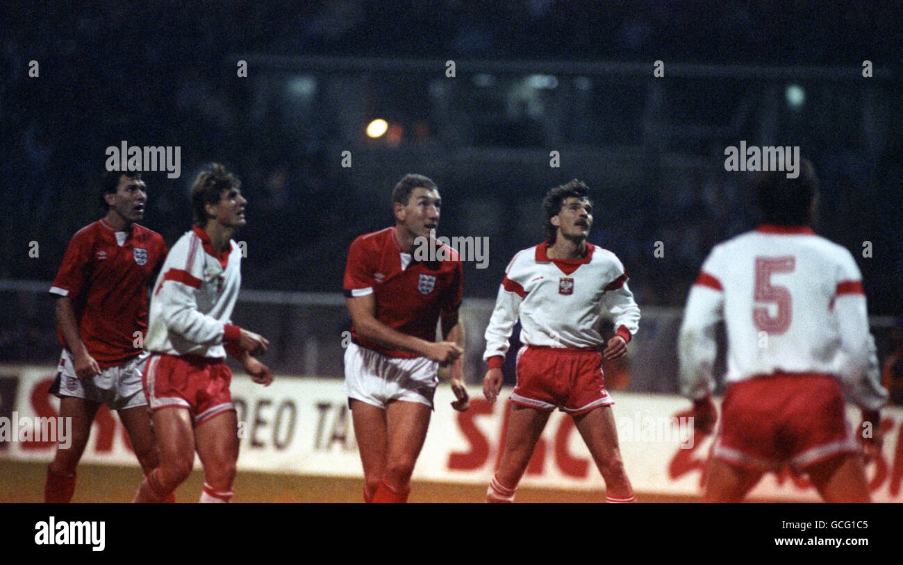 England's Bryan Robson (l) and Terry Butcher (c) in action against ...