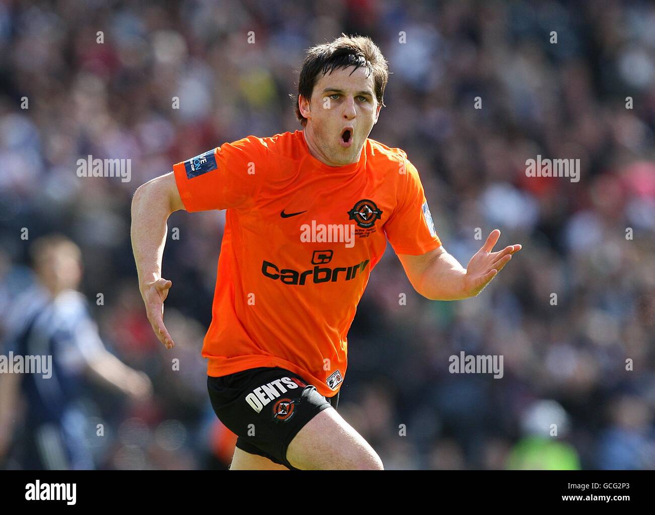 Dundee United's Craig Conway celebrates scoring his second and his ...