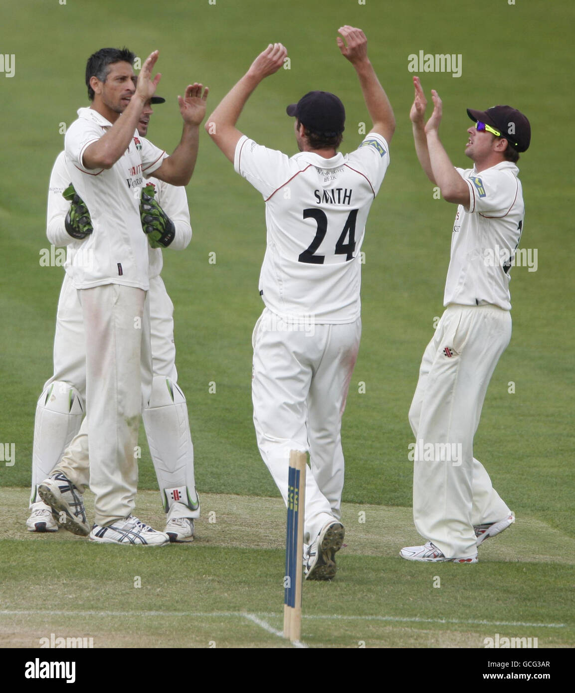 Lancashire's Sajid Mahmood (left) celebrates taking the wicket of ...