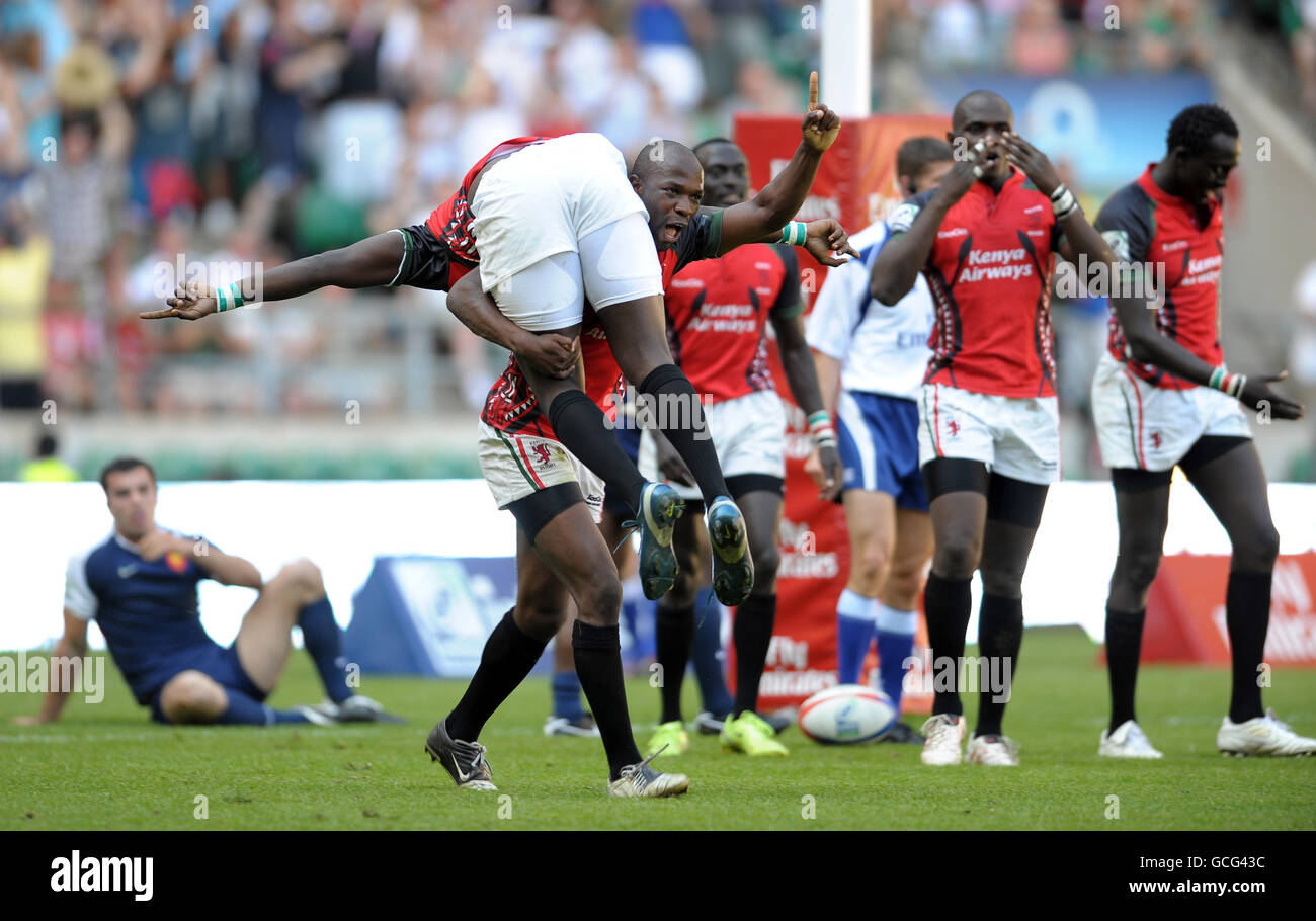 Kenya's Brian Nyikuli is picked up by team mate Leon Adongo as they ...