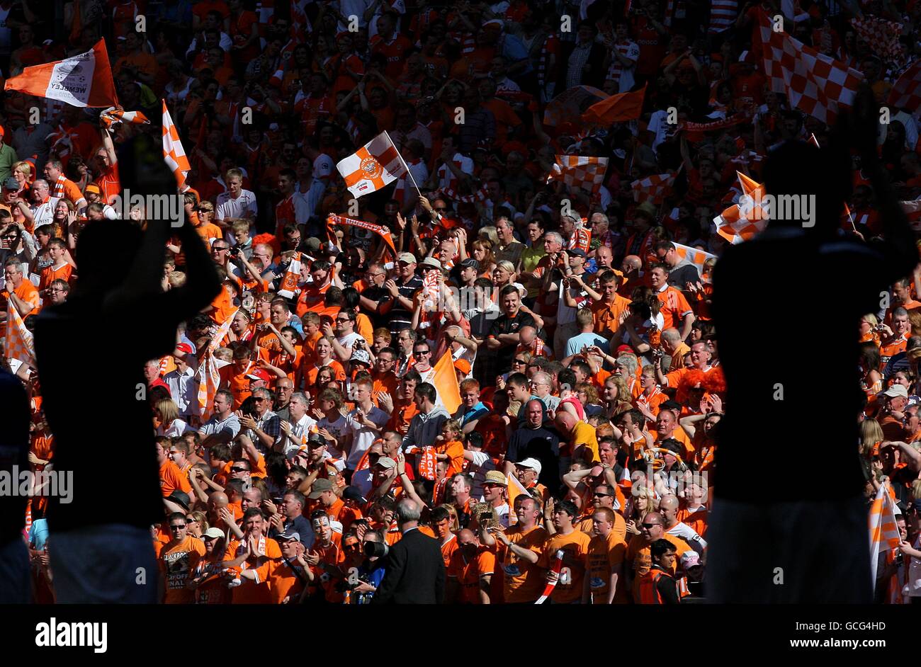 Blackpool players celebrate infront of blackpool fans in the stands hi ...