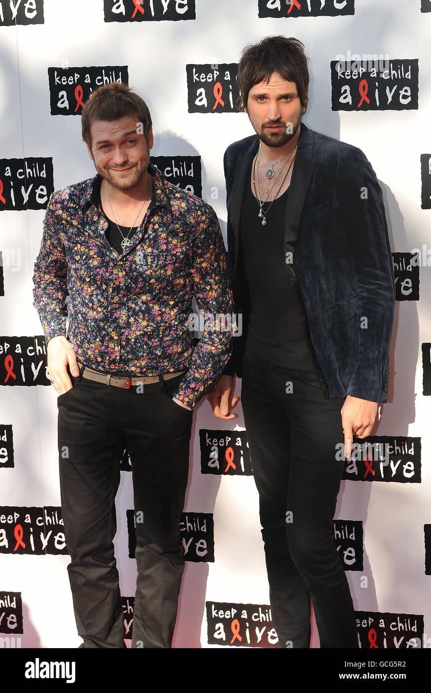 Kasabian vocalist Tom Meighan, left, and guitarist Sergio Pizzorno ...