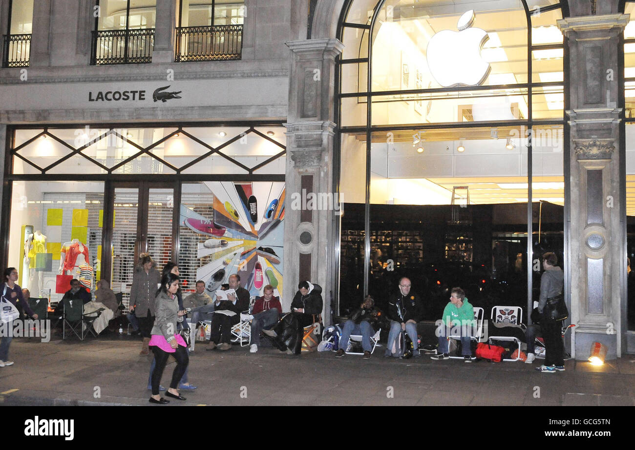 Customers queue overnight at the Apple store in London's Regent Street ...
