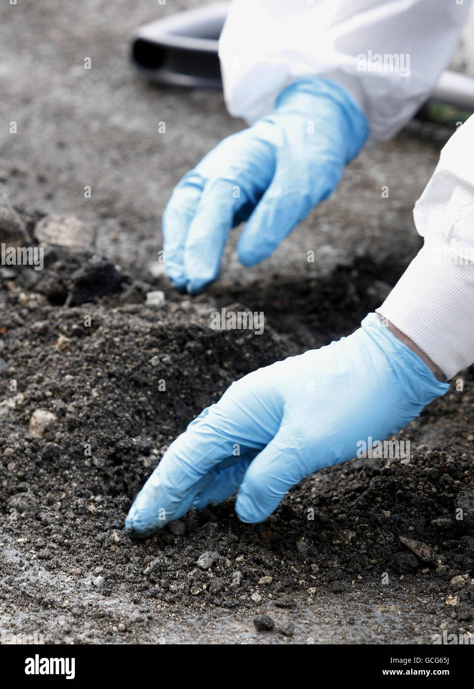 Forensic officers search an area near the home of Stephen Griffiths, 40 ...