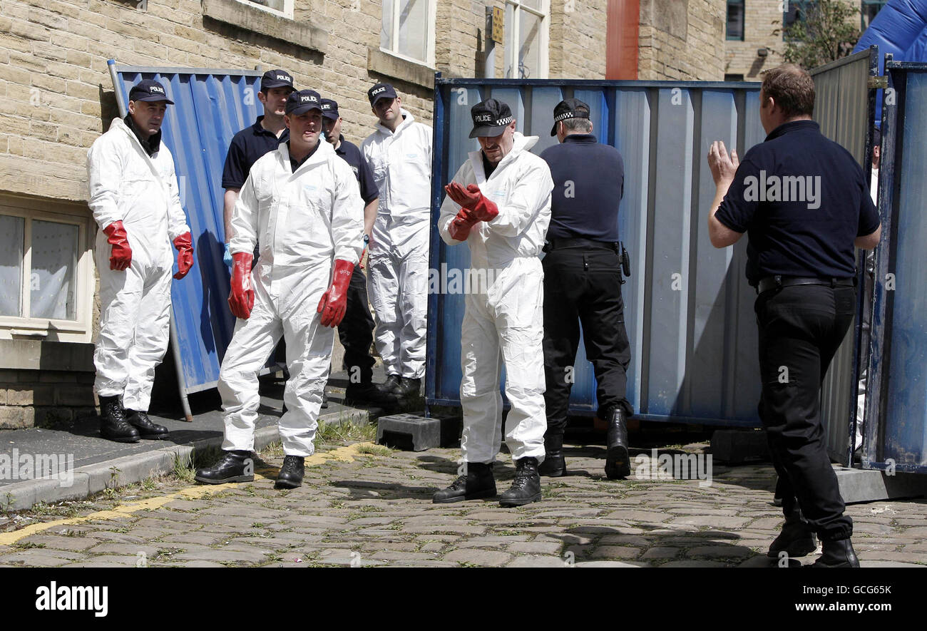 Forensic officers search an area near the home of Stephen Griffiths, 40 ...