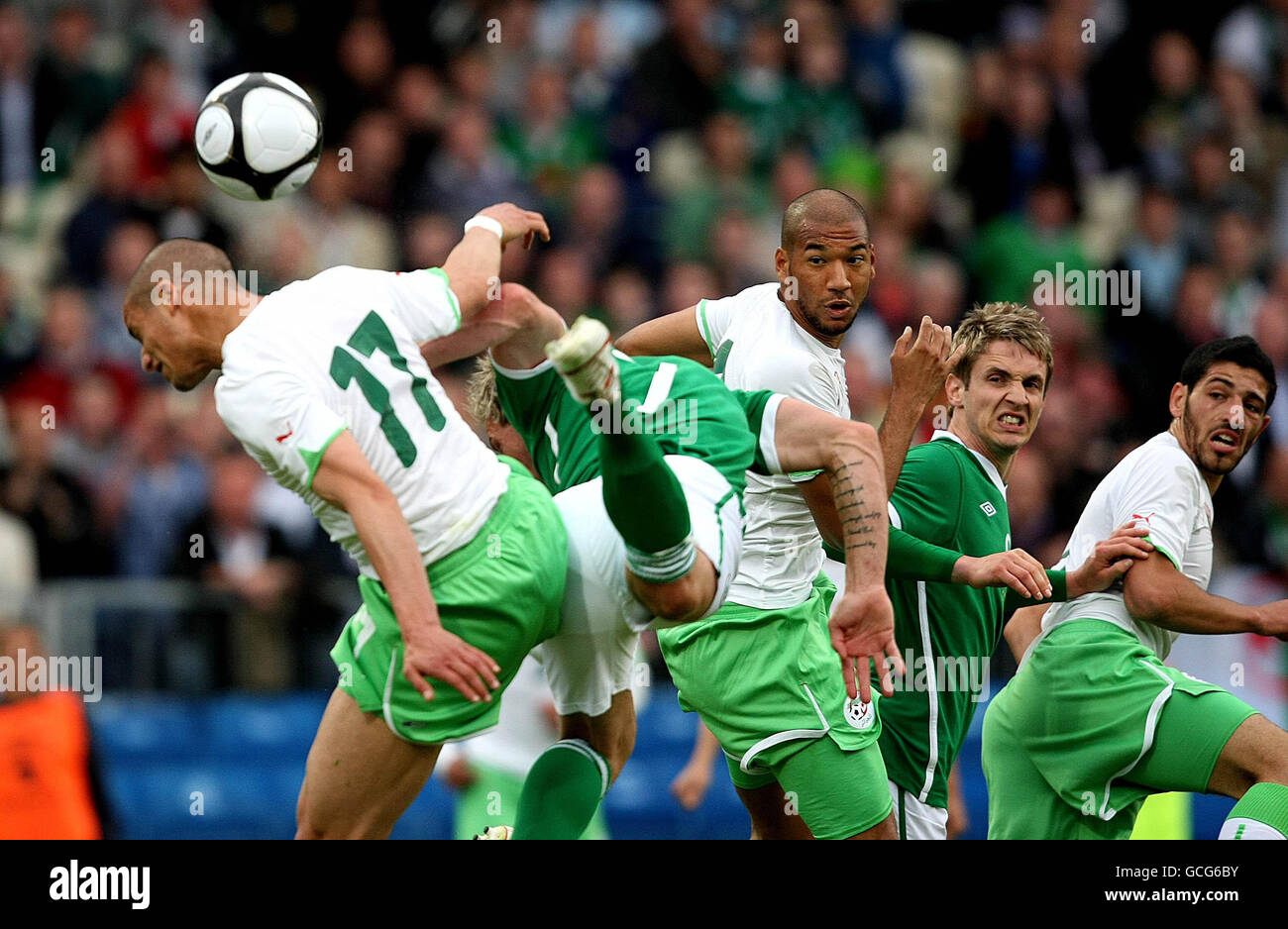 Soccer ireland action tackling football players mangdm hi-res stock ...