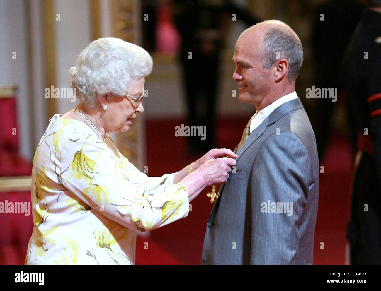 Simon King, from Bruton, receives an OBE from Britain's Queen Elizabeth ...