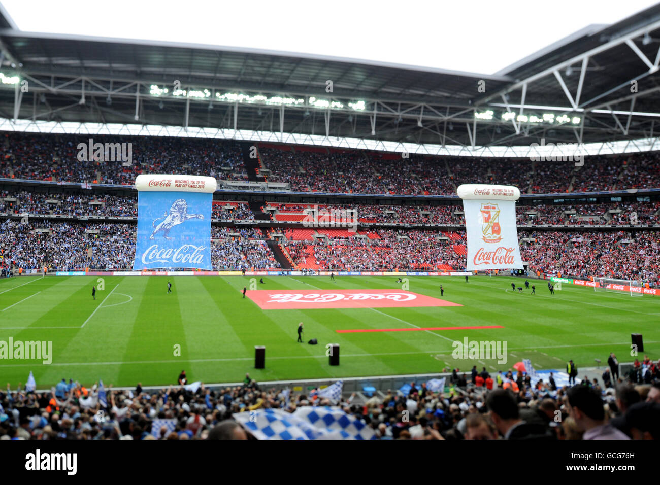 Millwall and Swindon Town flags suspended from the roof of Wembley ...