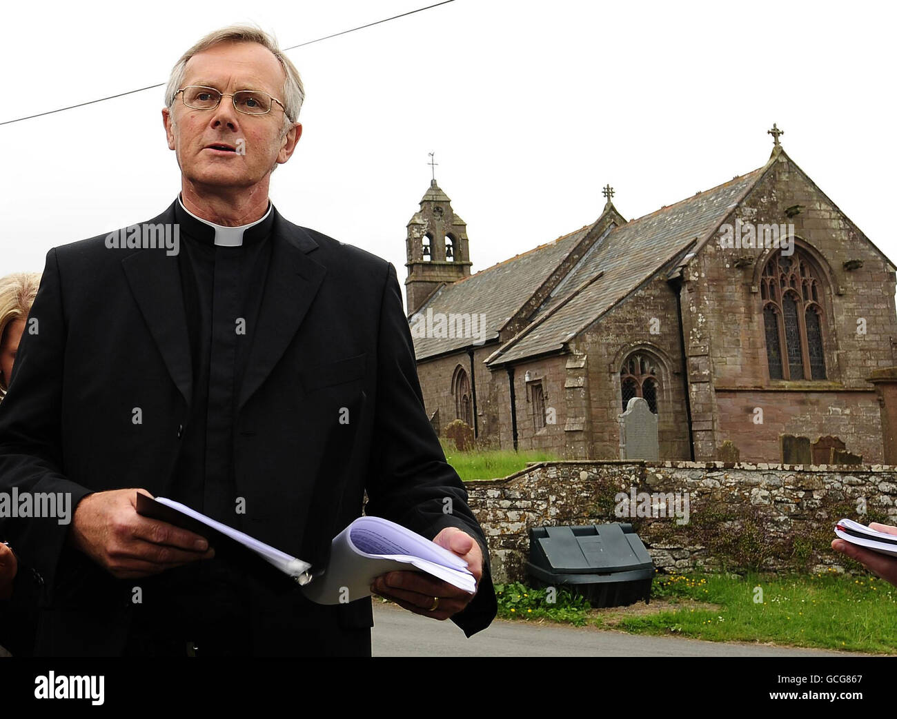 The Rev Jim Marshall reads a statement on behalf of the family of ...