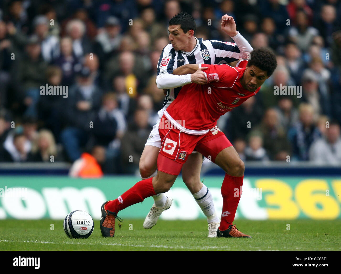 West Bromwich Albion's Graham Dorrans and Barnsley's Ryan Shotton ...