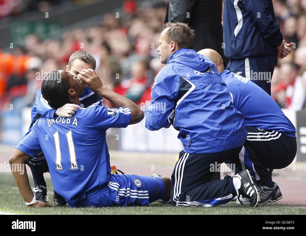 Chelseas didier drogba recieves treatment for an injury hi-res stock ...