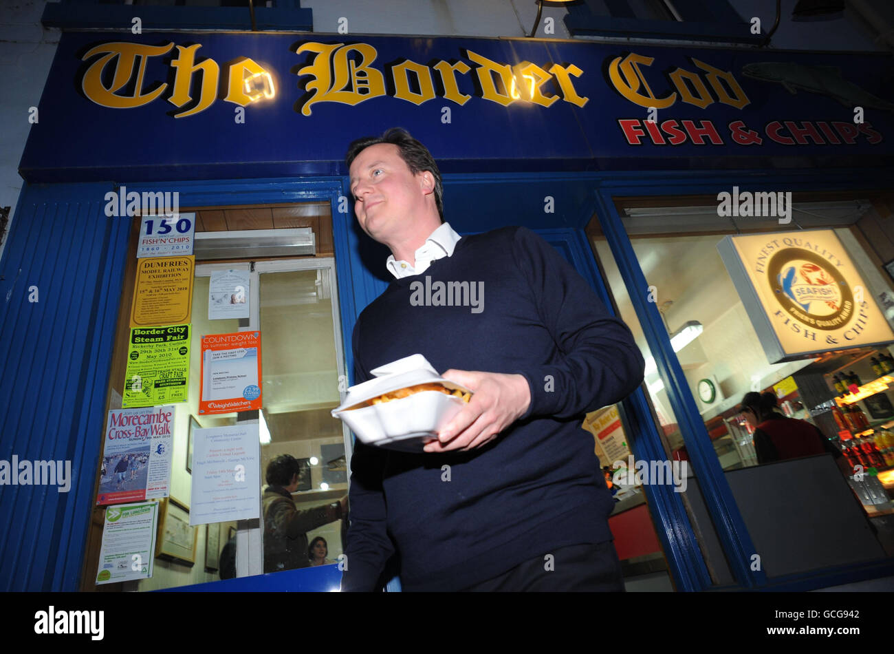 Conservative Party leader David Cameron stops to buy fish and chips in ...
