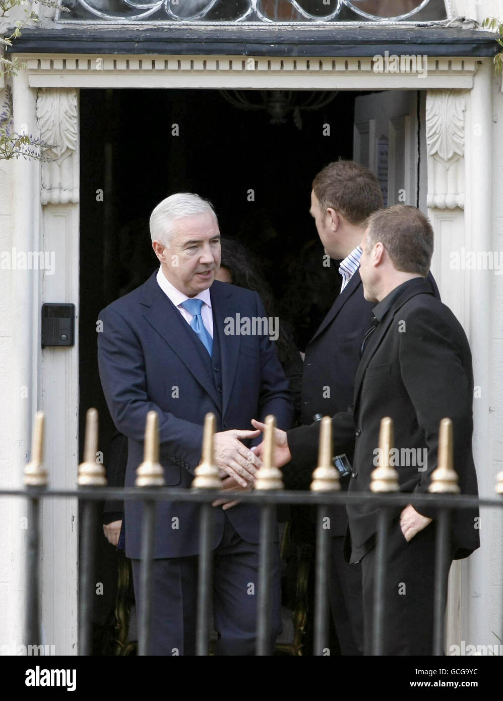 Property Developer Sean Dunne (left) leaves Gerry Ryan's family home in ...