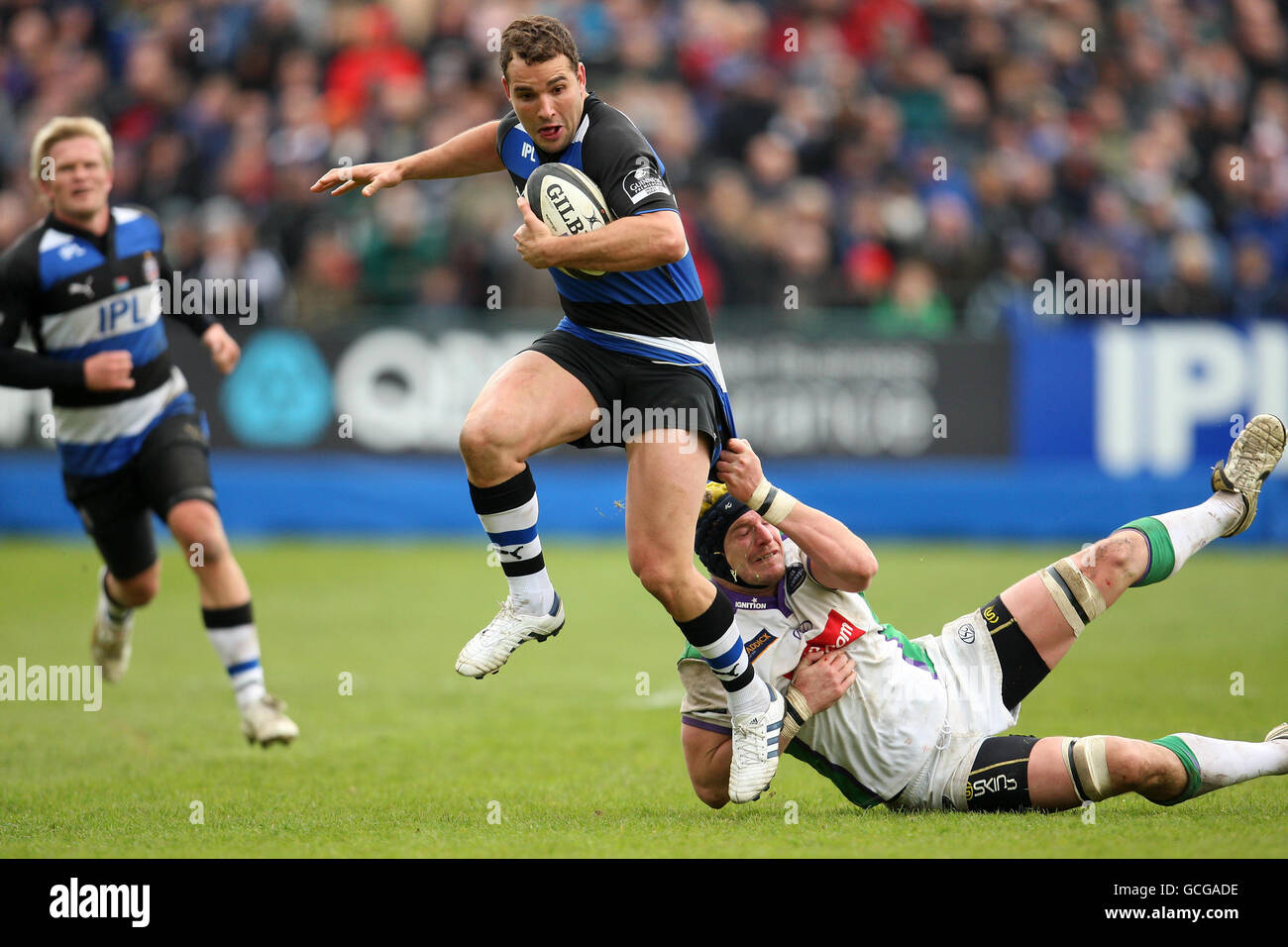 Bath Rugby's Olly Barkley is tackled by Leeds Carnegie's Rhys Oakley ...