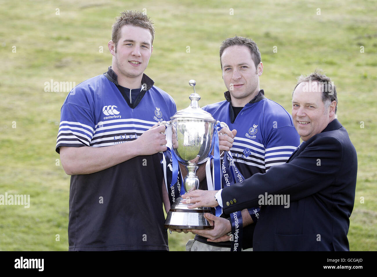 Scottish Rugby Council member Archie Ferguson (right) presents Dalziel ...