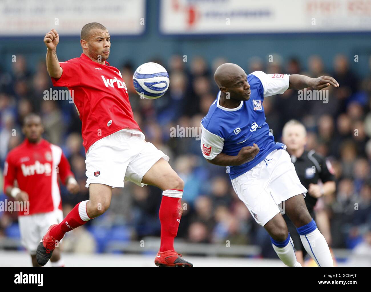 Oldham Athletic's Reuben Hazell (right) beats Charlton Athletic's Deon ...