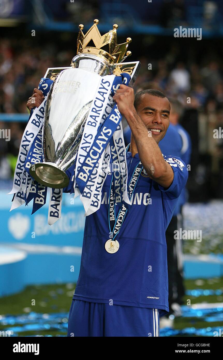 Chelsea's Ashley Cole celebrates with the Premier League trophy after ...
