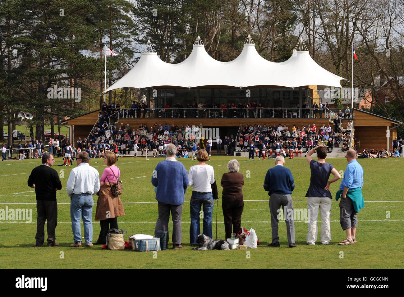 Spectators watch the match from the side of the pitch Stock Photo - Alamy