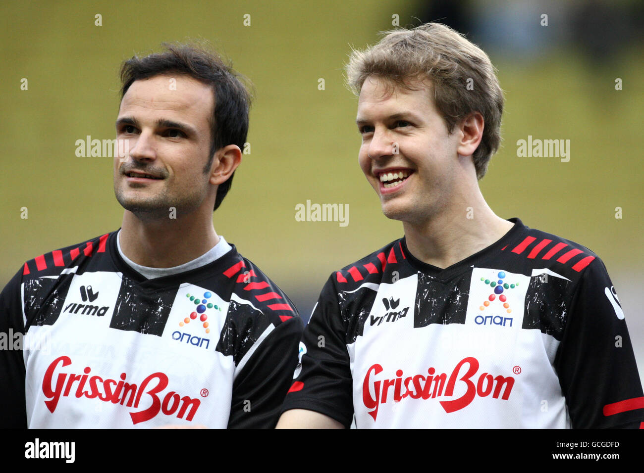 Force India's Vitantonio Liuzzi (left) and Red Bull Racing's Sebastian ...