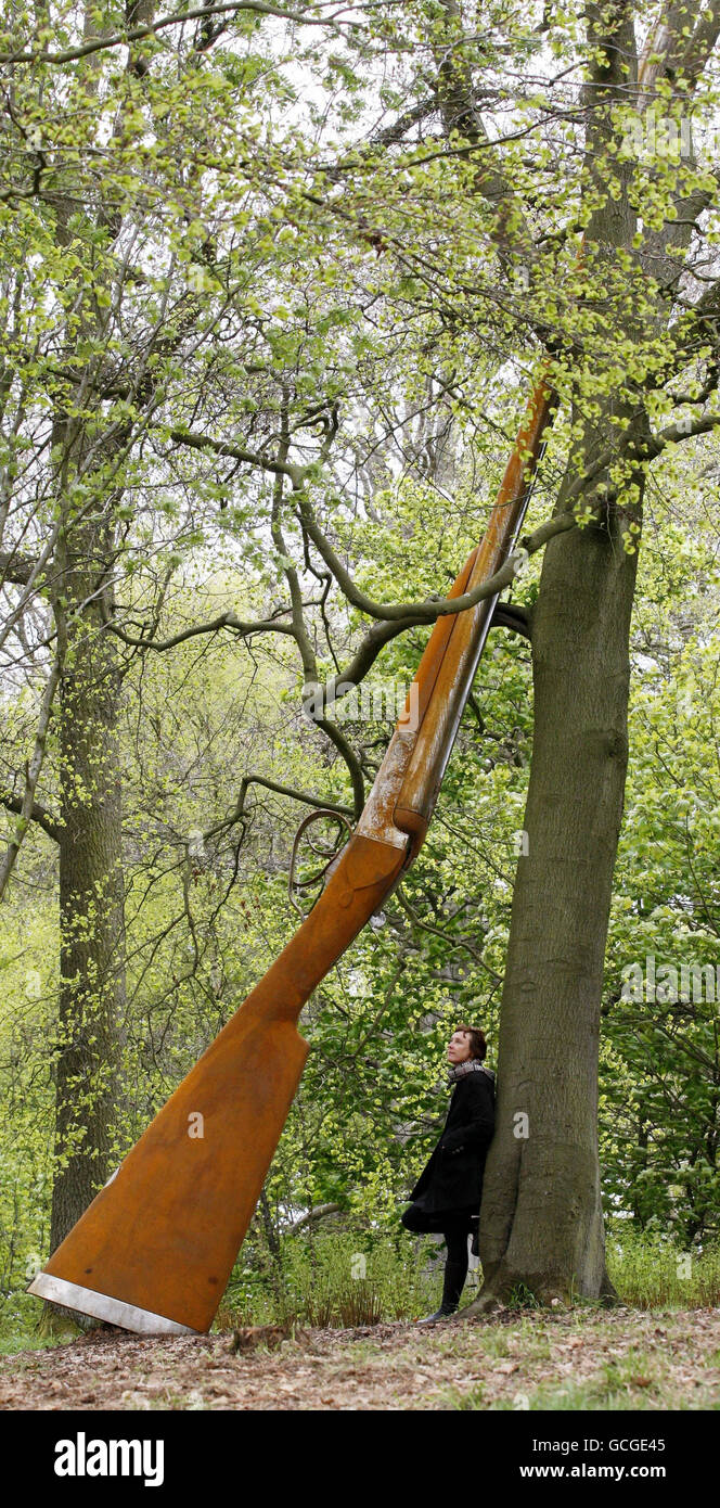 Artist Cornelia Parker with her work 'Landscape with Gun and Tree' a 9m ...
