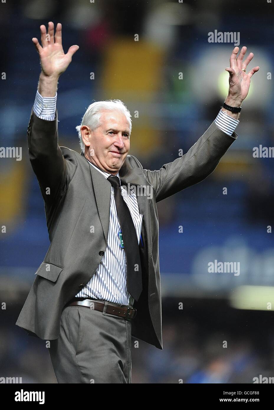 Former Chelsea goalkeeper Peter Bonetti waves to fans from the pitch at ...