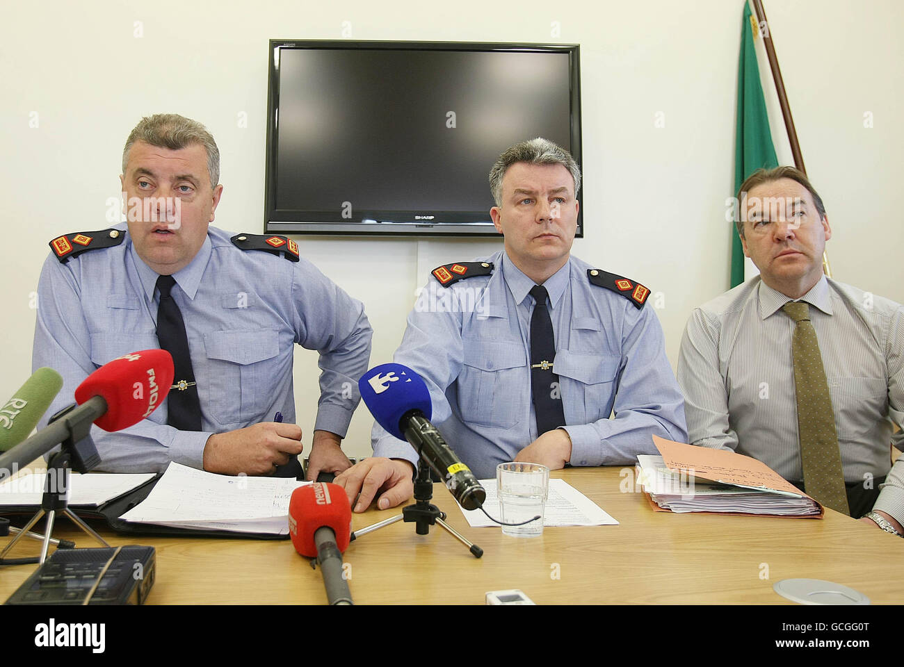 Crime garda ireland half length mid top sitting microphone uniform hi ...