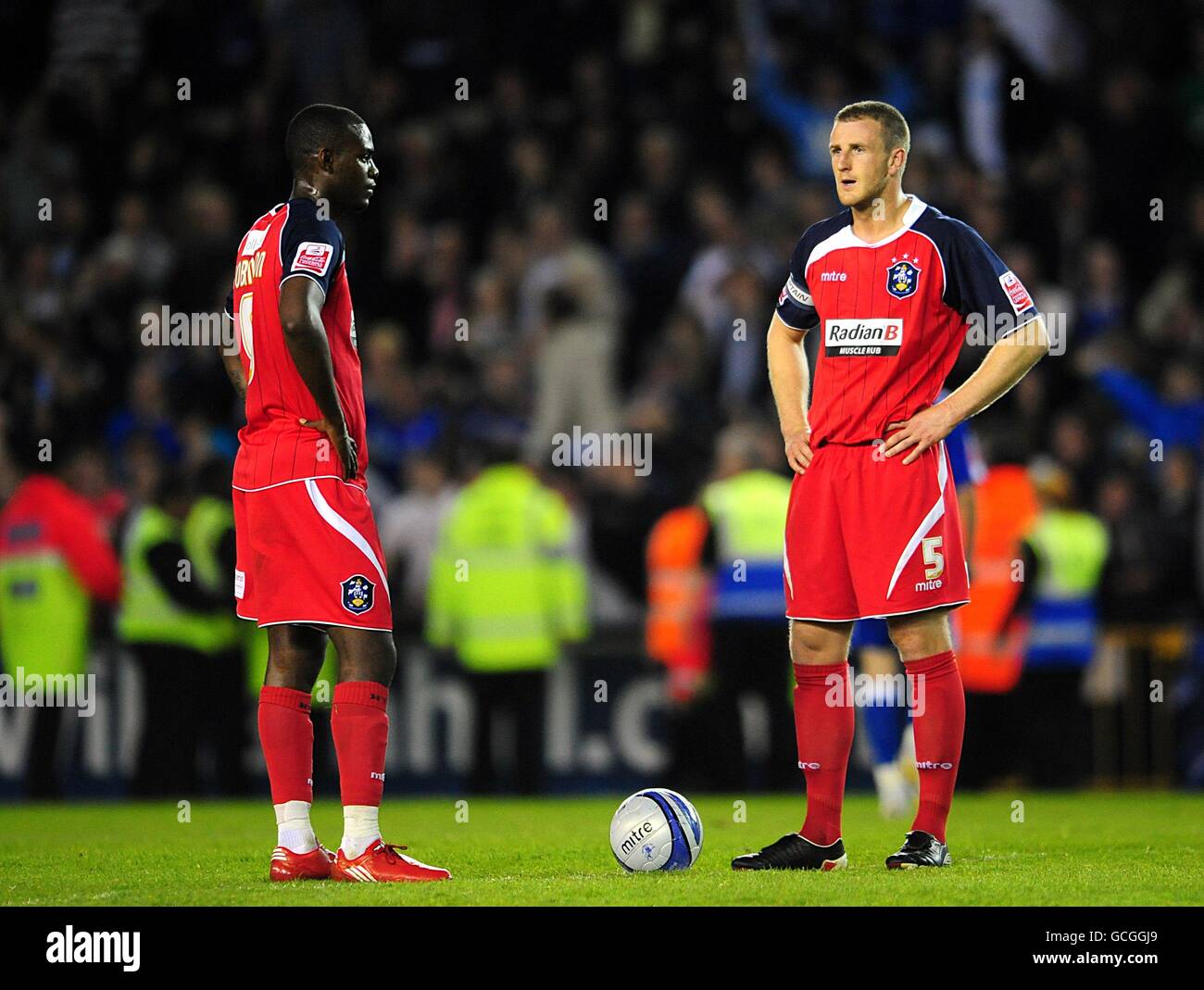 Huddersfield Town's Peter Clarke (right) and Neal Trotman, stand ...