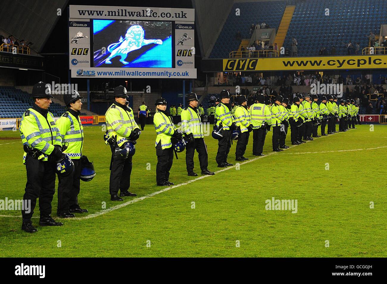 Police stand on the pitch after the full time whistle Stock Photo - Alamy