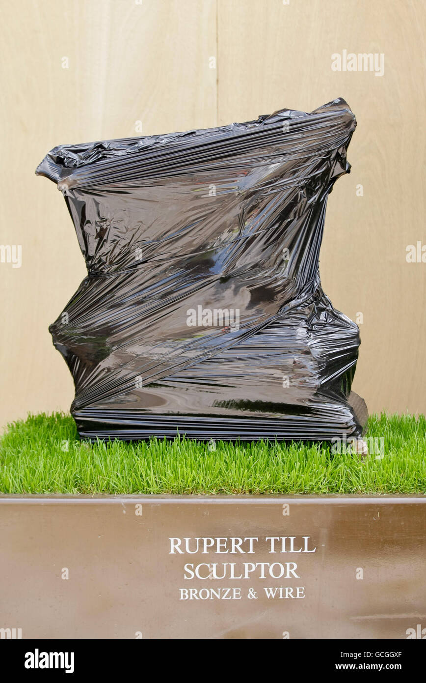 A Rupert Till sculpture under wraps during preparations for the RHS ...