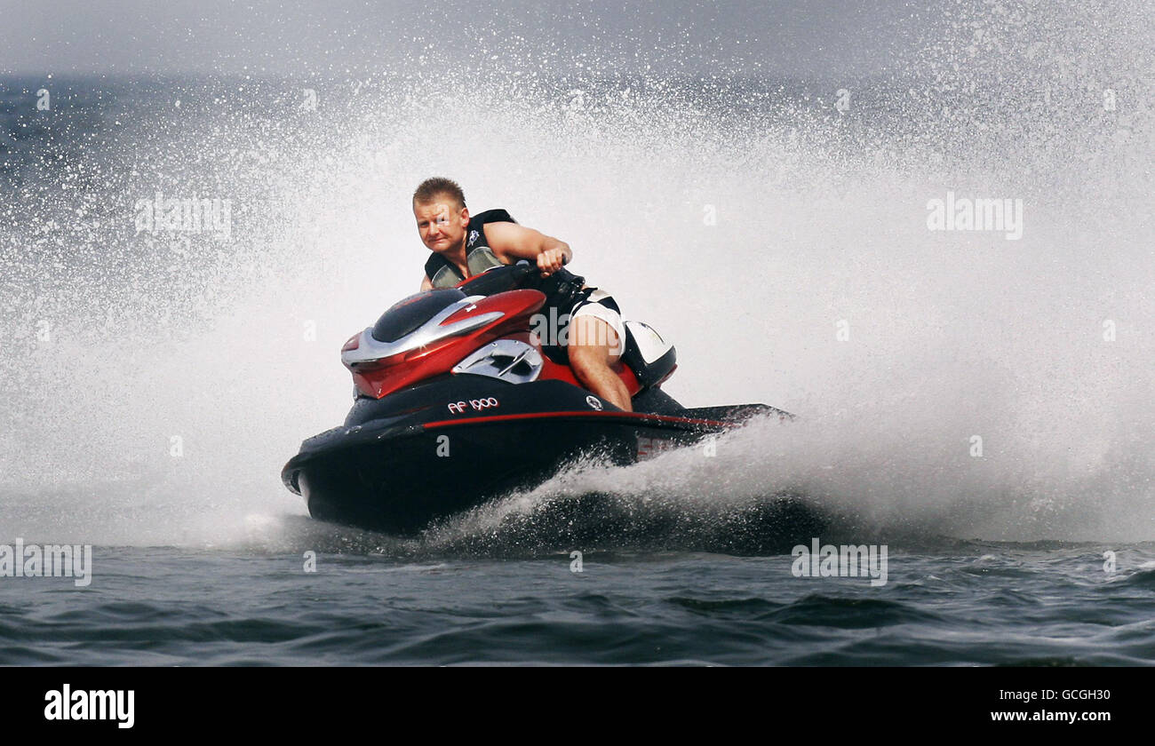 A member of the public enjoying the hot weather on a jet ski at ...