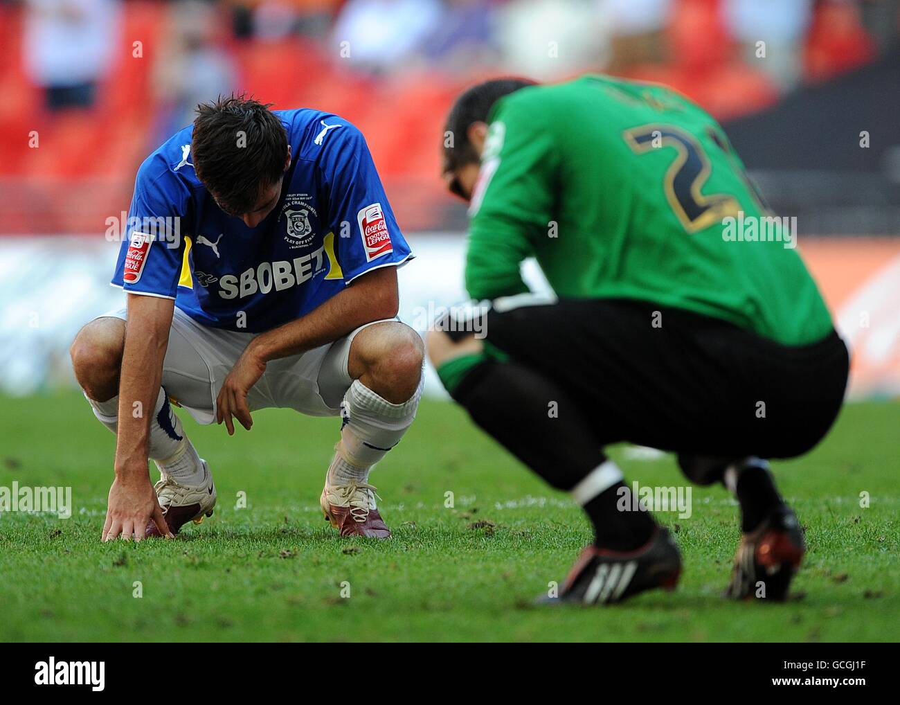 Blackpool goalkeeper Matthew Gilks (right) and Cardiff City's Joe ...
