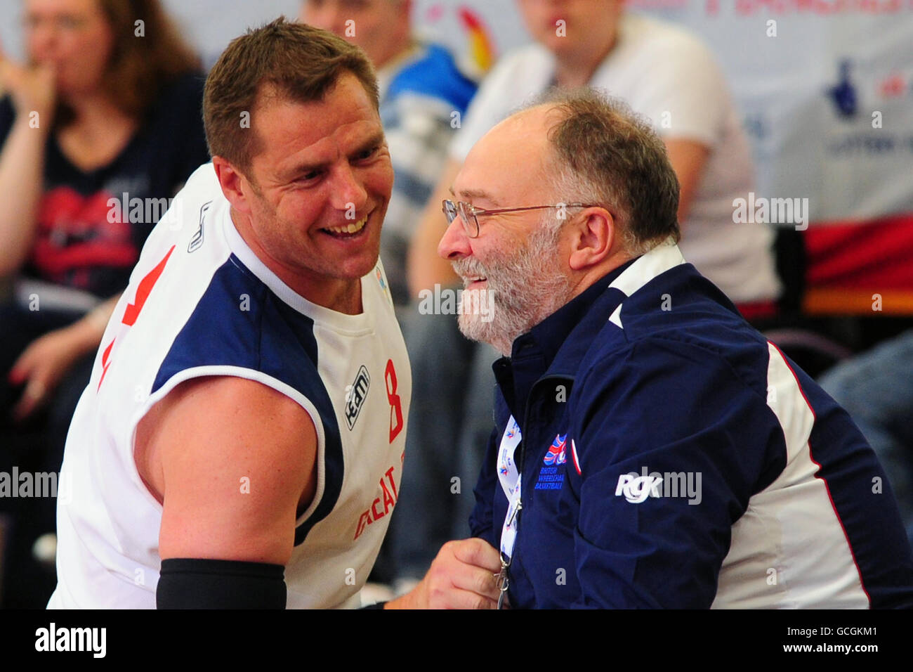 Great Britain's Simon Munn shares a joke with coach Murray Treseder in ...