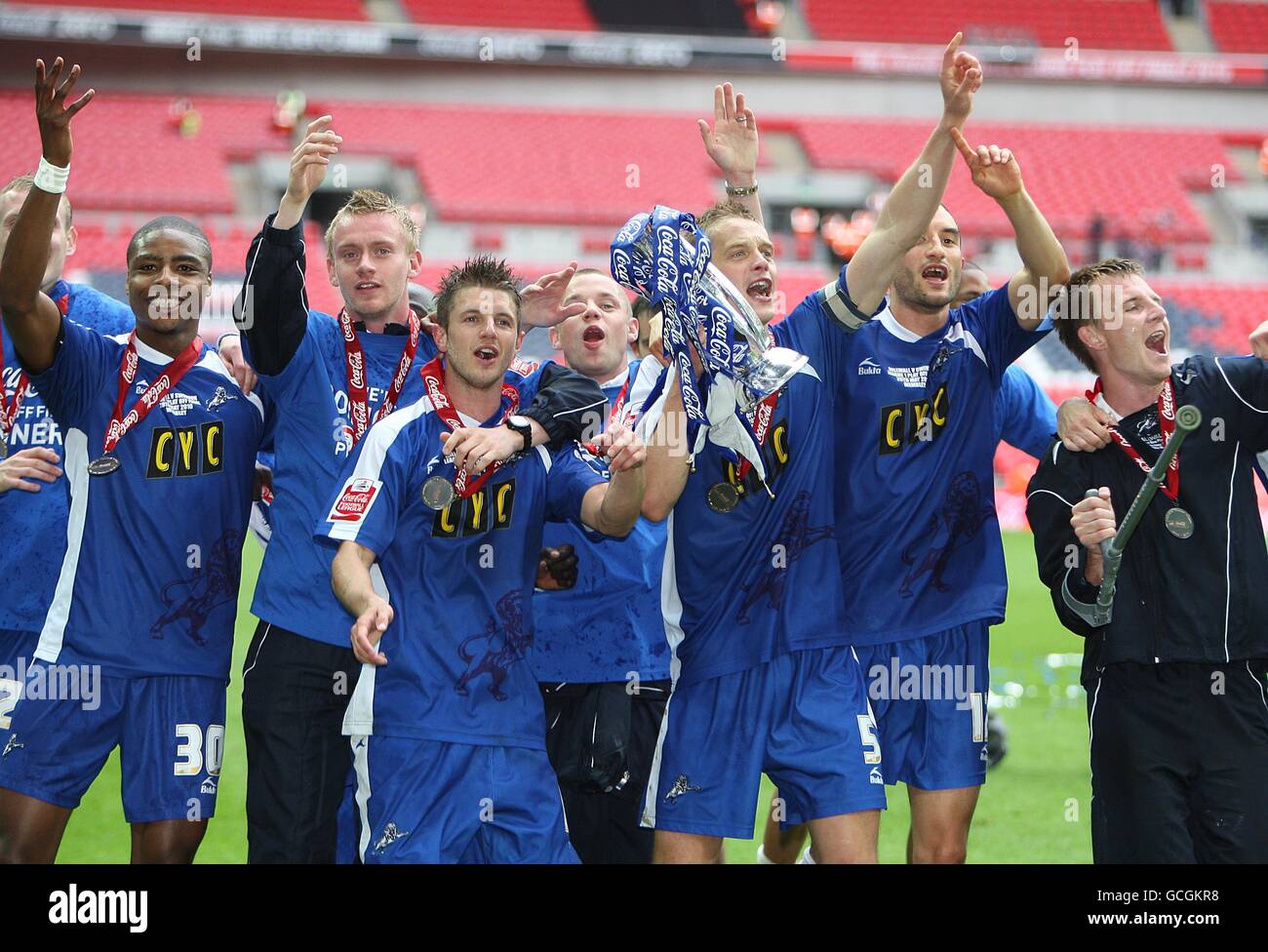 Football top celebrate celebration trophy hi-res stock photography and ...