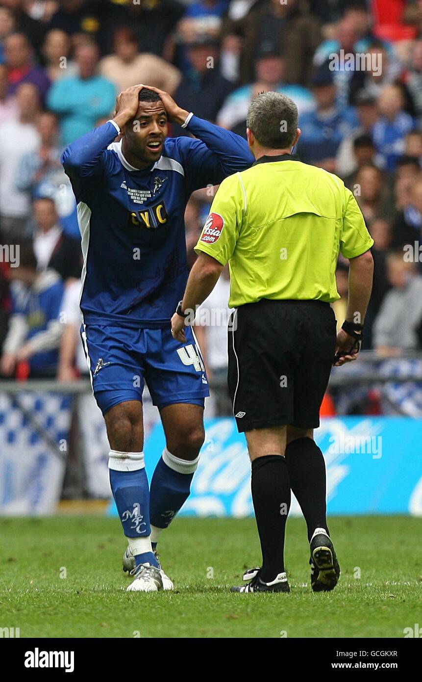 Millwalls liam trotter left argues with referee colin webster hi-res ...
