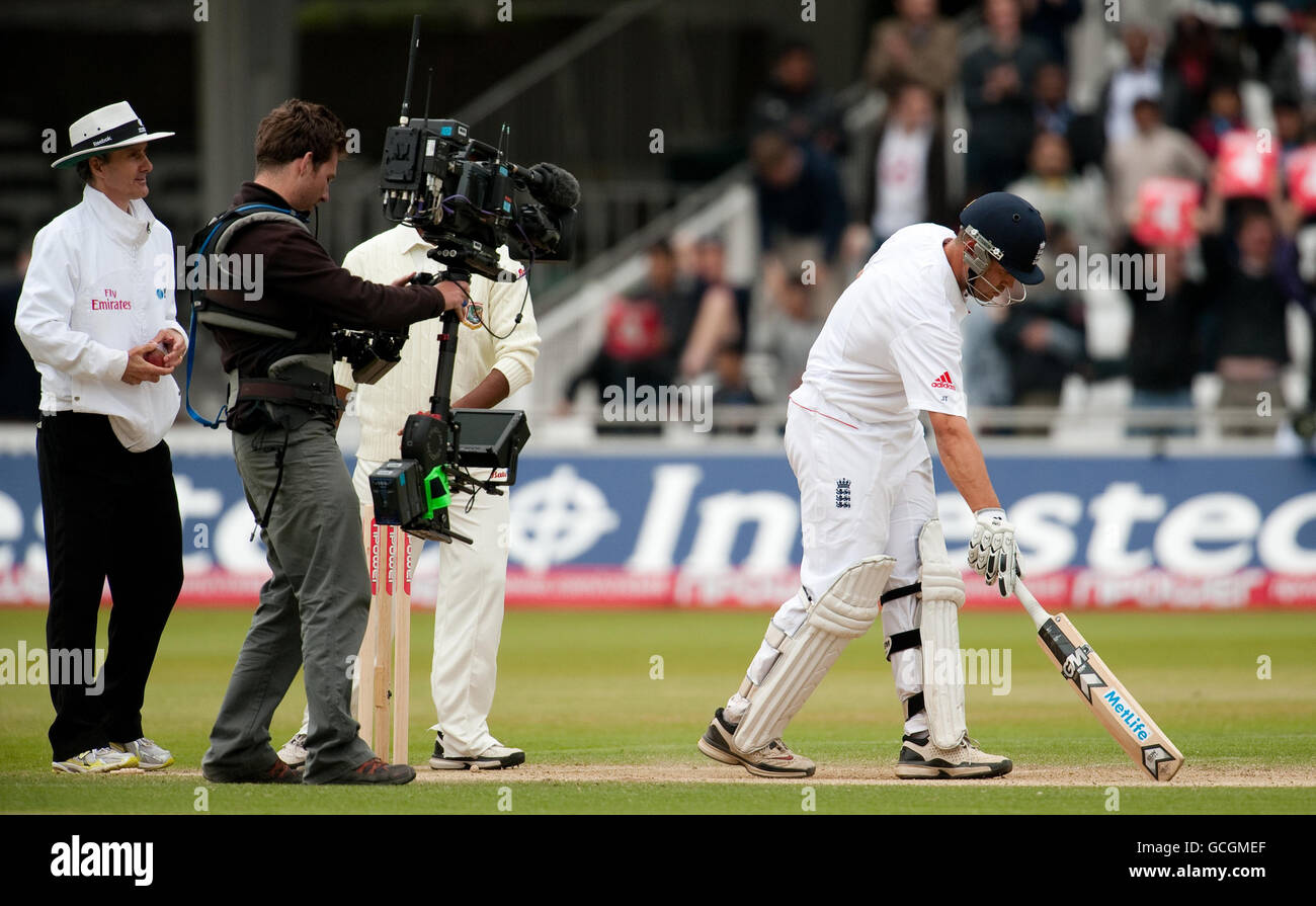 England's Jonathan Trott continues to mark his guard after beating ...