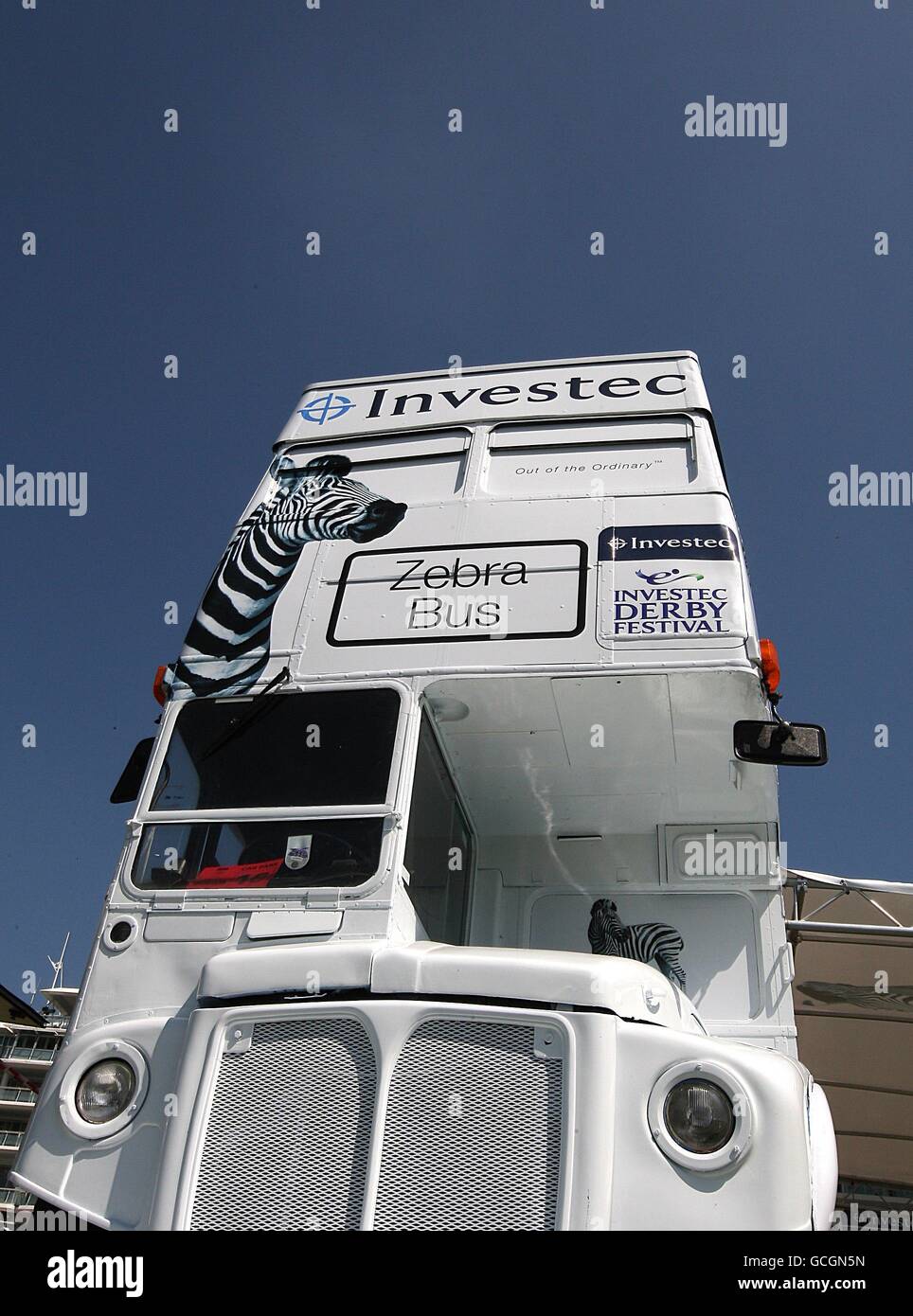 The Investec Zebra bus during Ladies Day, at Epsom Racecourse Stock ...